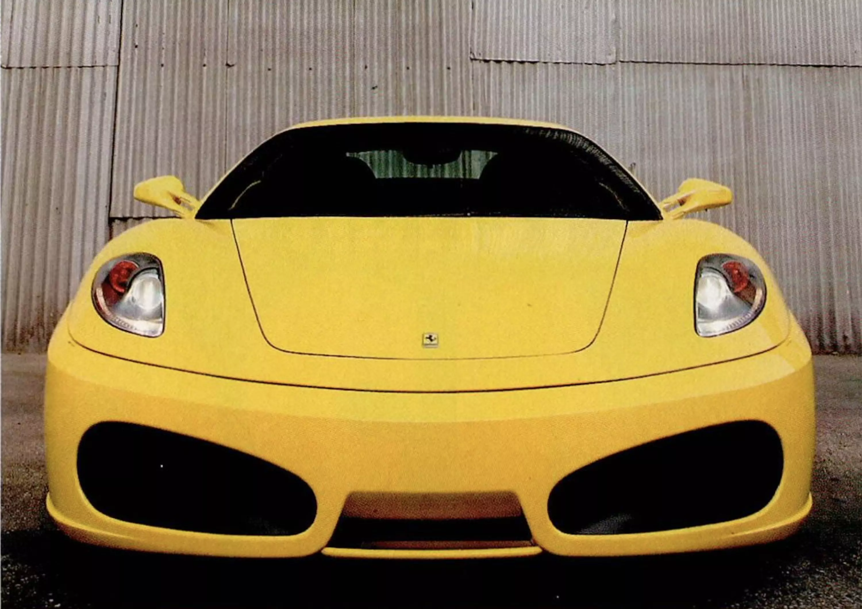 prawf cyntaf ferrari f430 ffordd a thrac