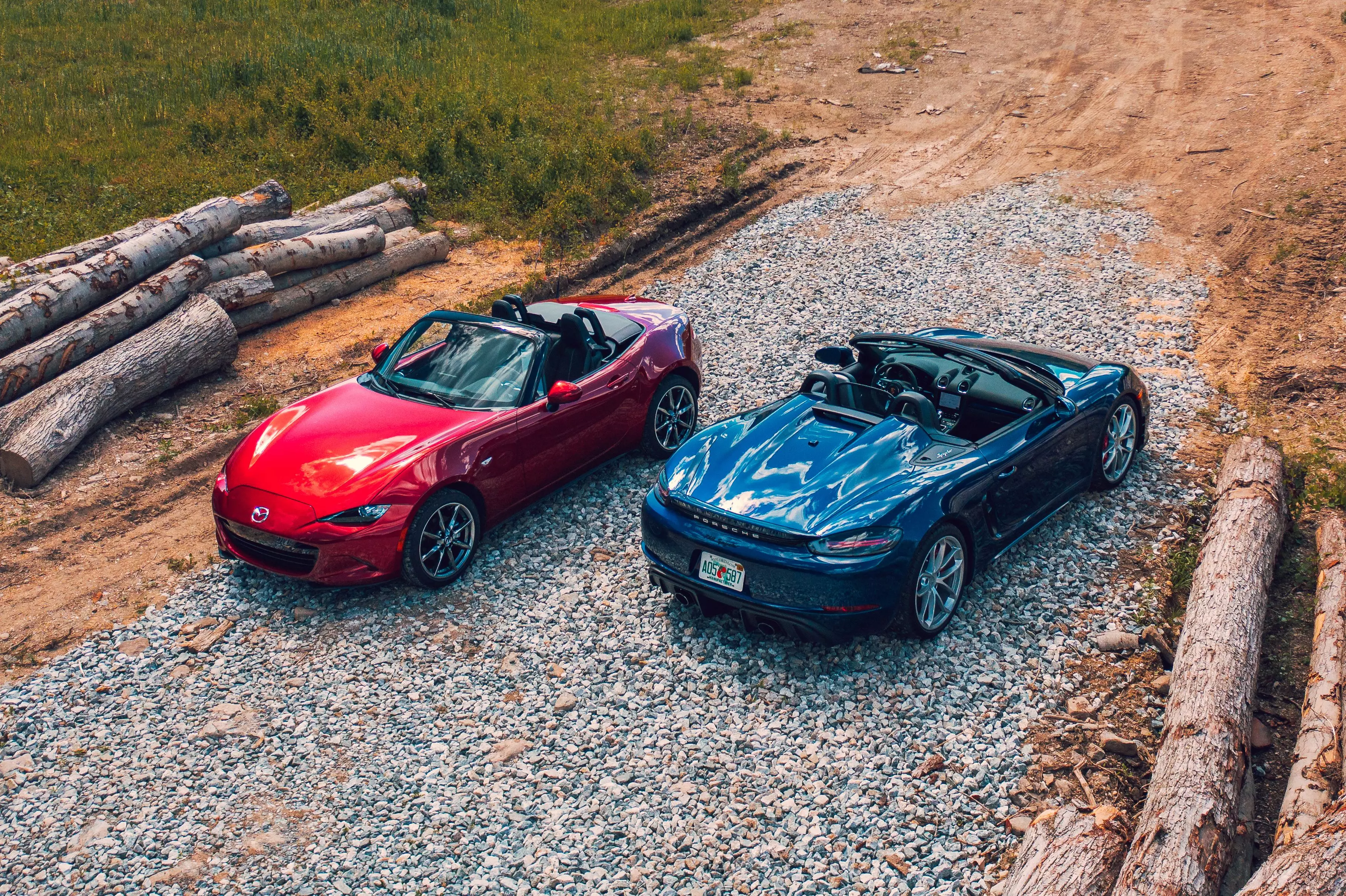 Mazda Miata आणि Porsche Boxster स्पोर्ट्स-कार परफेक्शन मिळवतात