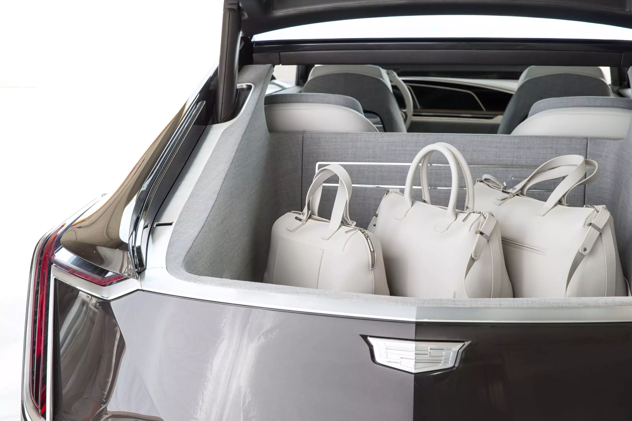 Trunk, Gray, Baggage, Luxury nga sakyanan, Silver, Personal luxury car, Convertible, Steel, Car seat, Handle,