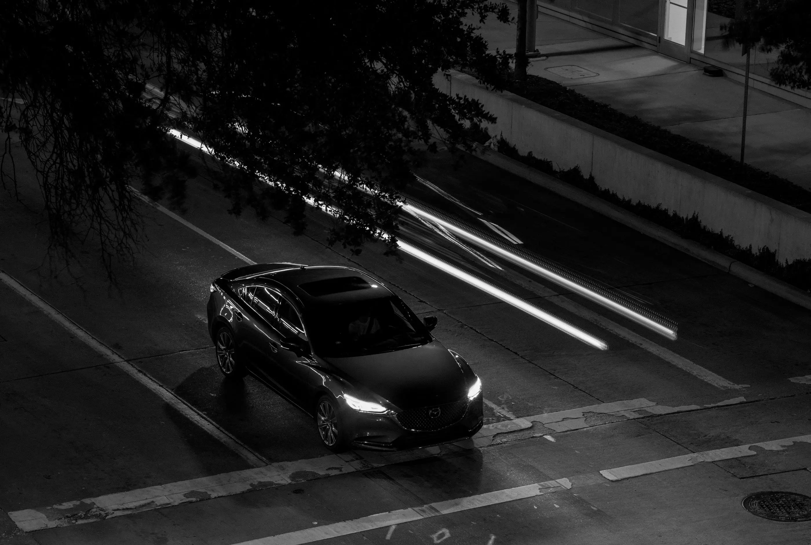 Vehículo terrestre, Vehículo, Coche, Negro, Deseño automotriz, Modo de transporte, Coche urbano, Coche de alto rendemento, Iluminación automotriz, Estrada,